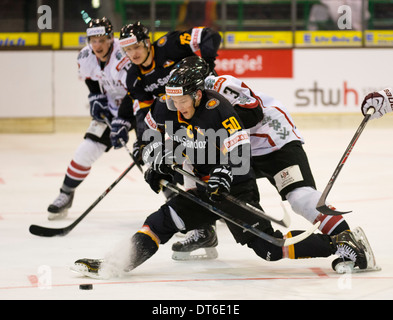 German international ice hockey player Patrick Hager, in front, plays for the German national ...