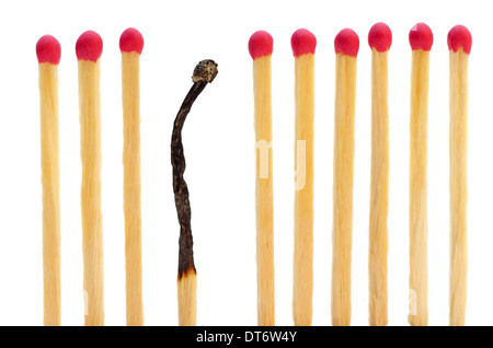 Matches on a row with one burned, isolated on white background Stock ...