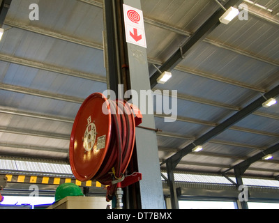 symbolic safety signs fb3 fire hose Stock Photo - Alamy