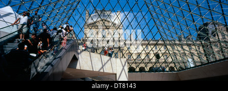 Louvre. Access under the pyramidal dome Stock Photo - Alamy