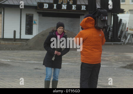 Sky News's reporter Becky Johnson getting buffeted by the high winds ...