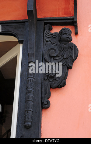 Decorative wood framed window on a old red wood building Stock Photo ...