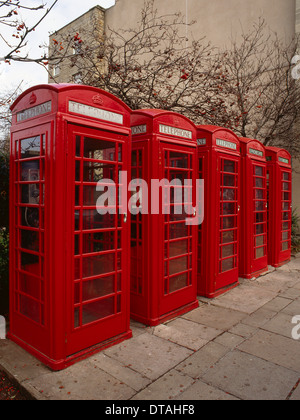 row of five K3 red telephone boxes and phonecard boxes, designed by ...