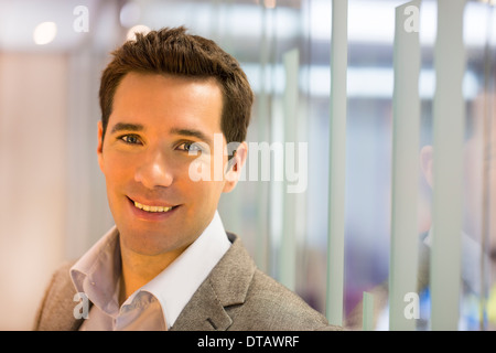 Face of young handsome businessman looking at camera Stock Photo - Alamy