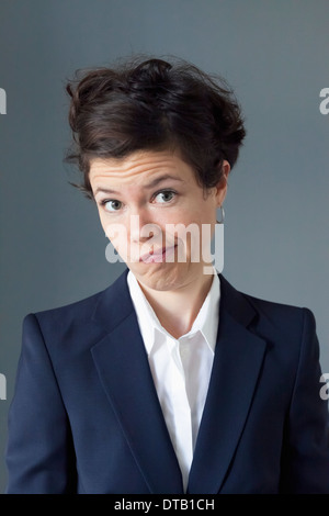 Making business decisions. Studio portrait of an attractive young ...