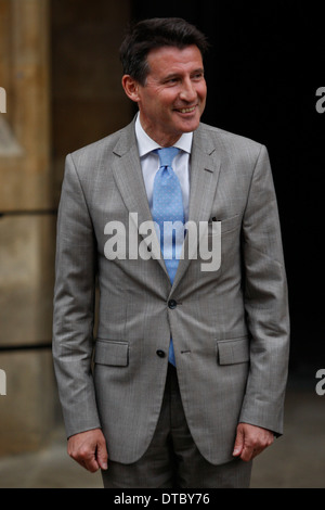 The Olympic medals are seen on the hands of Chairman of London 2012 ...