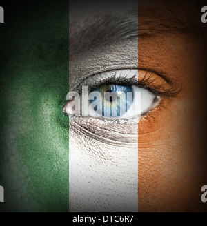 Woman face painted with flag of Ireland Stock Photo - Alamy