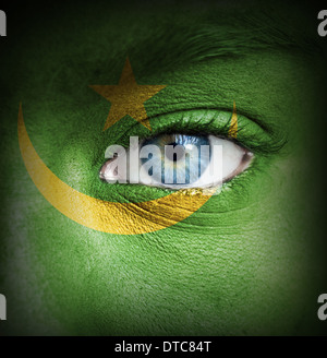 Human face painted with flag of Mauritania Stock Photo - Alamy