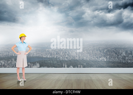 Composite image of serious attractive architect posing Stock Photo - Alamy