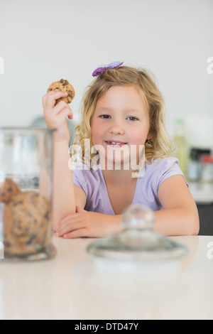 Child with a cookie jar Stock Photo - Alamy