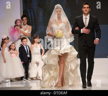 Zagreb, Croatia. 15th Feb, 2014. A model presents a wedding dress at ...