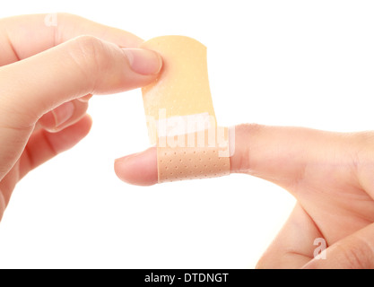 Female fingers with band aid on white background Stock Photo - Alamy