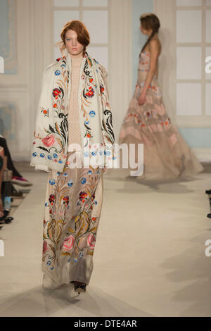 16 February 2014, London, England, UK. Models walk the runway at the ...