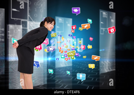 Composite image of smiling businesswoman bending Stock Photo - Alamy