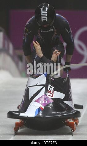 Pilot Steven Holcomb and Steven Langton of USA team 1 compete in the ...
