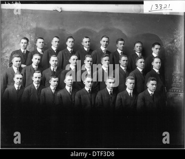 This group portrait from 1914 features the bride, groom, maid of honor ...