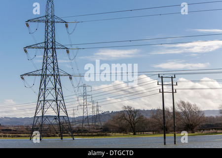 Telegraph pylons in flooded fields near Gloucester, Gloucestershire ...