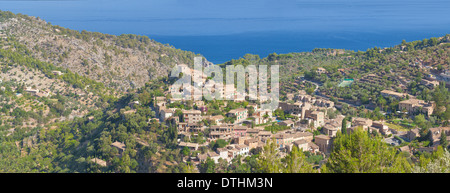 Church of Deià village and sailboat. sea. Majorca, Balearic islands ...