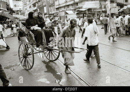 man pulling rickshaw, Calcutta, India Stock Photo - Alamy