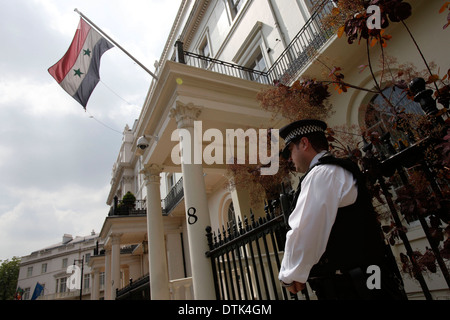 Metropolitan police officer is seen in front of the Syrian embassy in ...