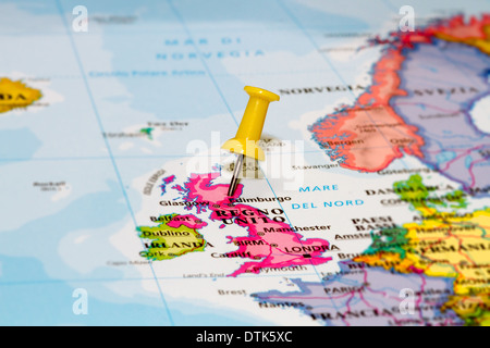 Map with a yellow pushpin stuck Stock Photo - Alamy