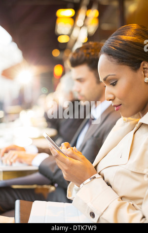 Side view of a business person working on laptop Stock Photo - Alamy