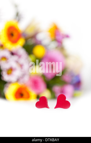 Postcard with small red flowers and a heart in the middle Stock Photo ...