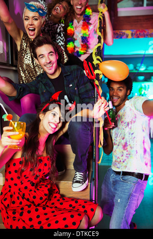 Women cheering together at party Stock Photo - Alamy