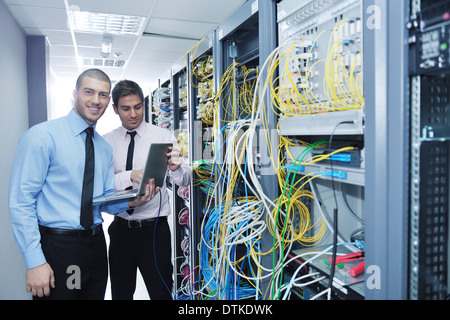 it engineers in network server room Stock Photo - Alamy