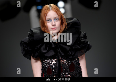 A model wears a design created by John Rocha during London Fashion ...