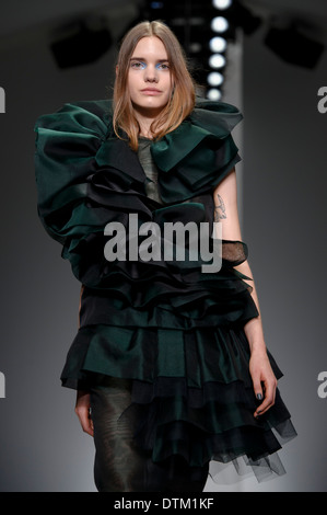 A model wears a design created by John Rocha during London Fashion ...