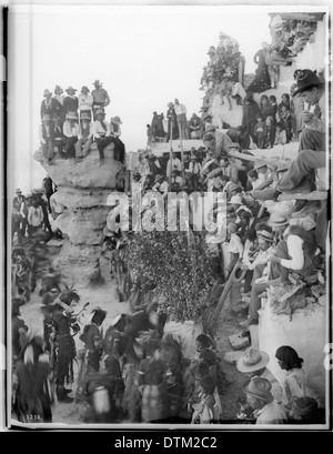 A photograph of spectators at the Hopi Indian village of Mishongnovi ...