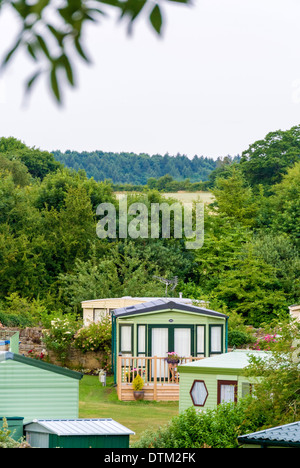 Green static caravans mobile homes trailers on a campsite in Tywyn ...