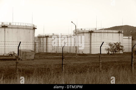 Huge old rusty fuel tanks Stock Photo - Alamy