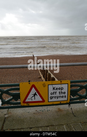 Keep off of the groynes warning notice Stock Photo - Alamy