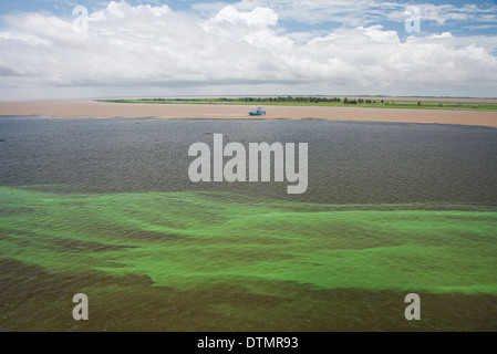 Brazil, Amazon River, Santarem. Meeting of the Waters. Rare bright ...