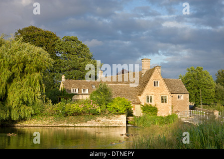 Fairford Mill and the River Coln in the small Cotswold town of Fairford ...