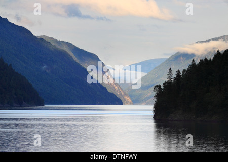 Mountains recede into the distance at Lake Bandak is in the ...