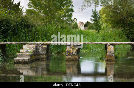 Eastleach Turville Church from the stone clapper bridge crossing the ...