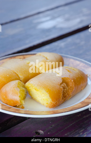 Close up of Mantou (Chinese steamed bun) with Thai pandan custard (Thai ...