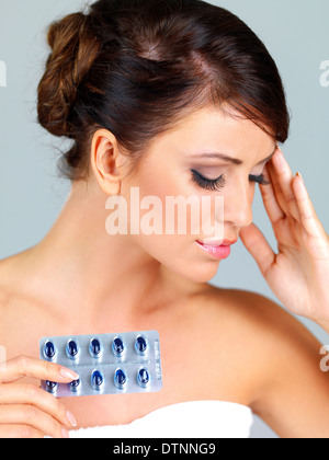 portrait of a girl with headache Stock Photo - Alamy