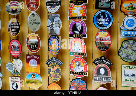 beer pump badges depicting the makers name and brand line a real ale ...