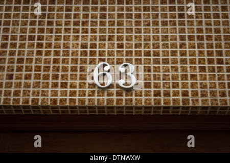 Door number 63 Stock Photo - Alamy