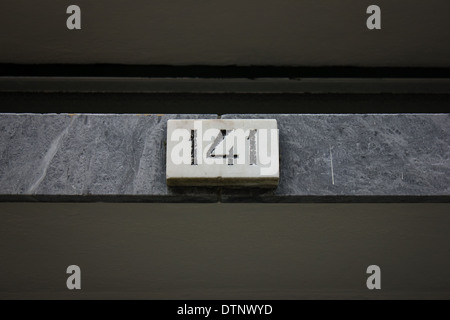 number 141 old weathered brown wooden window shutters on abandoned ...