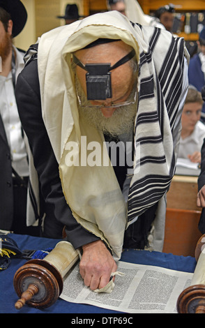 A blessing before Torah reading during weekday morning prayers at ...