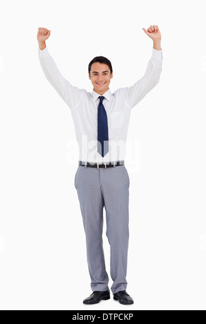 Excited businessman raising his arms Stock Photo - Alamy