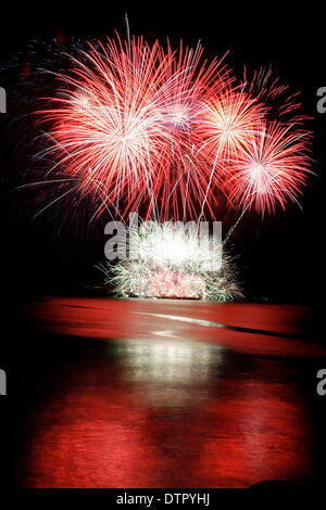 Pasay City, Philippines. 22nd Feb, 2014. People watch the fireworks ...