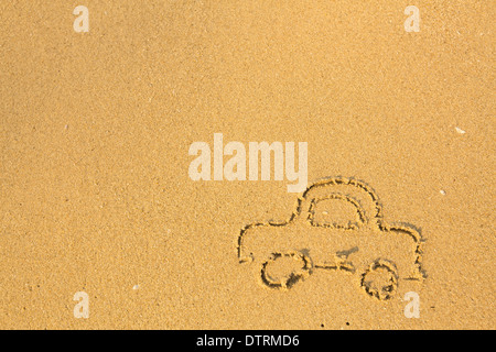Draw car on beach sand. Conceptual design Stock Photo - Alamy