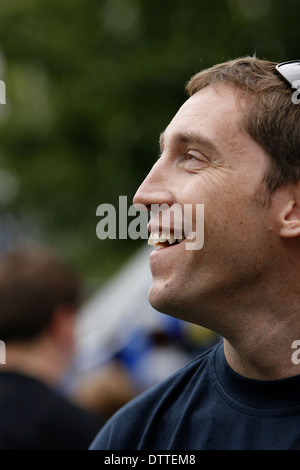 British Olympic swimmer Stephen Parry shows off his bronze medal won in ...