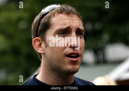 British Olympic swimmer Stephen Parry shows off his bronze medal won in ...